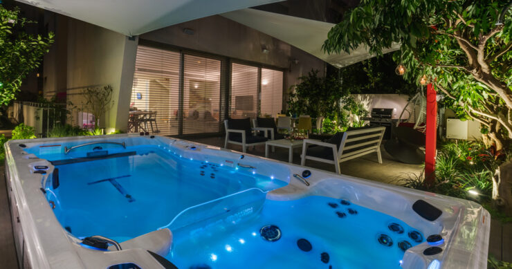 Swim spa star of small backyard makeover