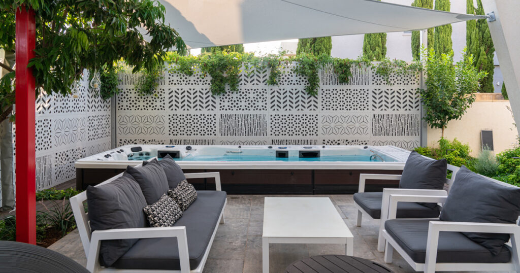 Swim spa star of small backyard makeover